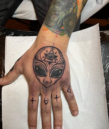 Alien Tattoos on Back Of Hand