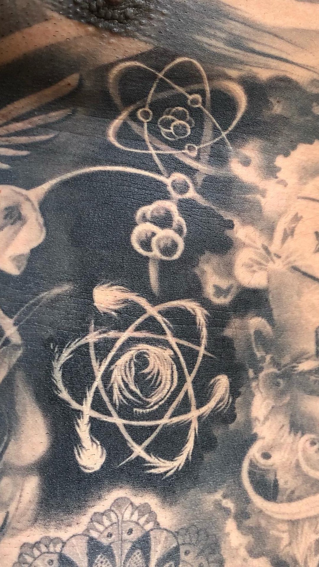 Atomic Rose & Bearded Portrait Chest Piece - Tattoos.com