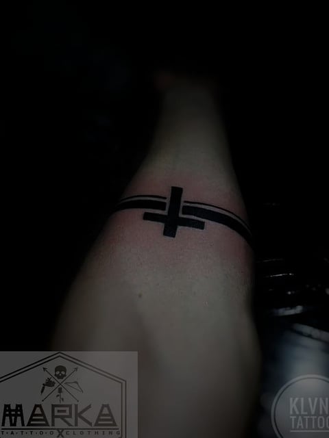 Bold Black Armband with Inverted Cross - Tattoos.com