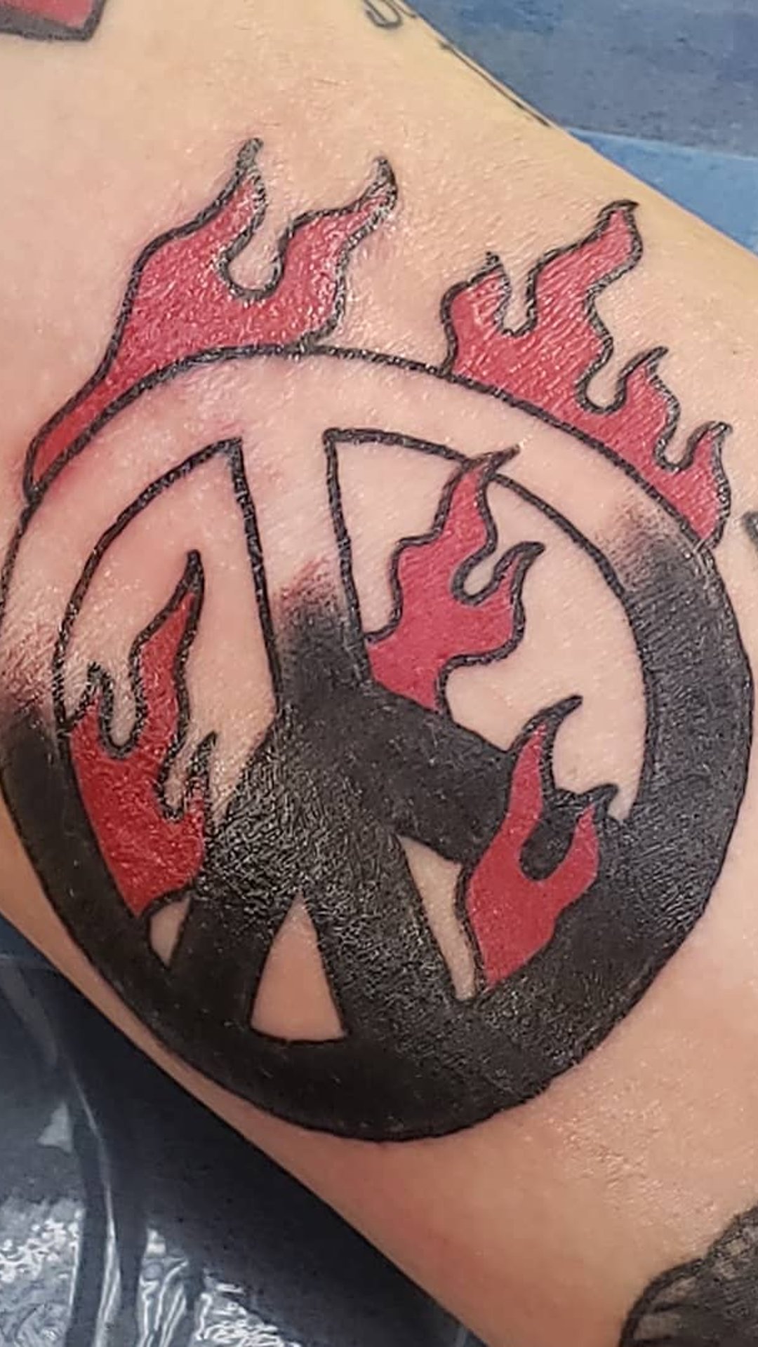 Burning Peace Sign - Tattoos.com