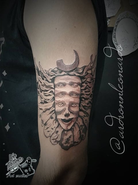 Four-Eyed Moon Mask - Tattoos.com