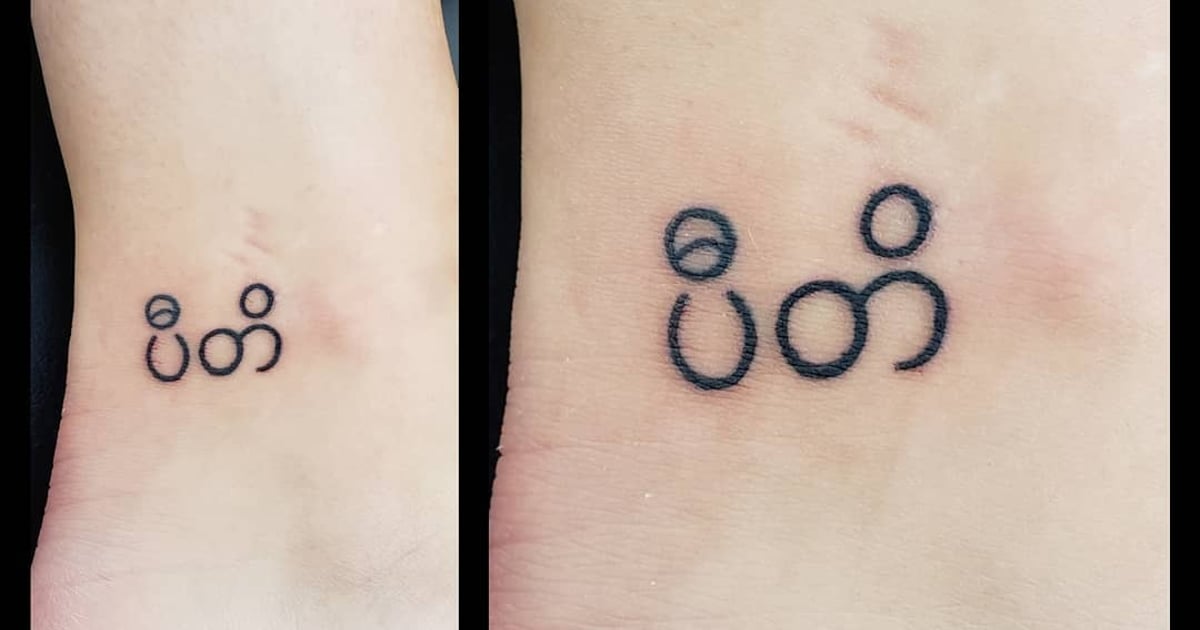 Minimal Southeast Asian Script Micro Tattoo - Tattoos.com