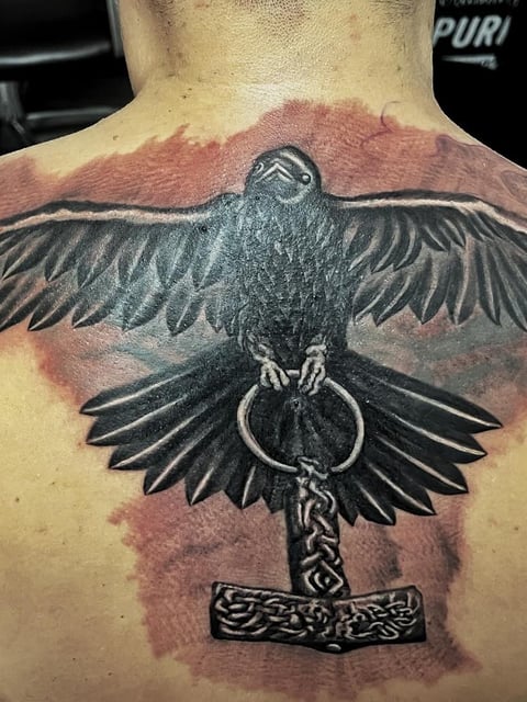 Odin's Raven and Mjölnir Backpiece - Tattoos.com