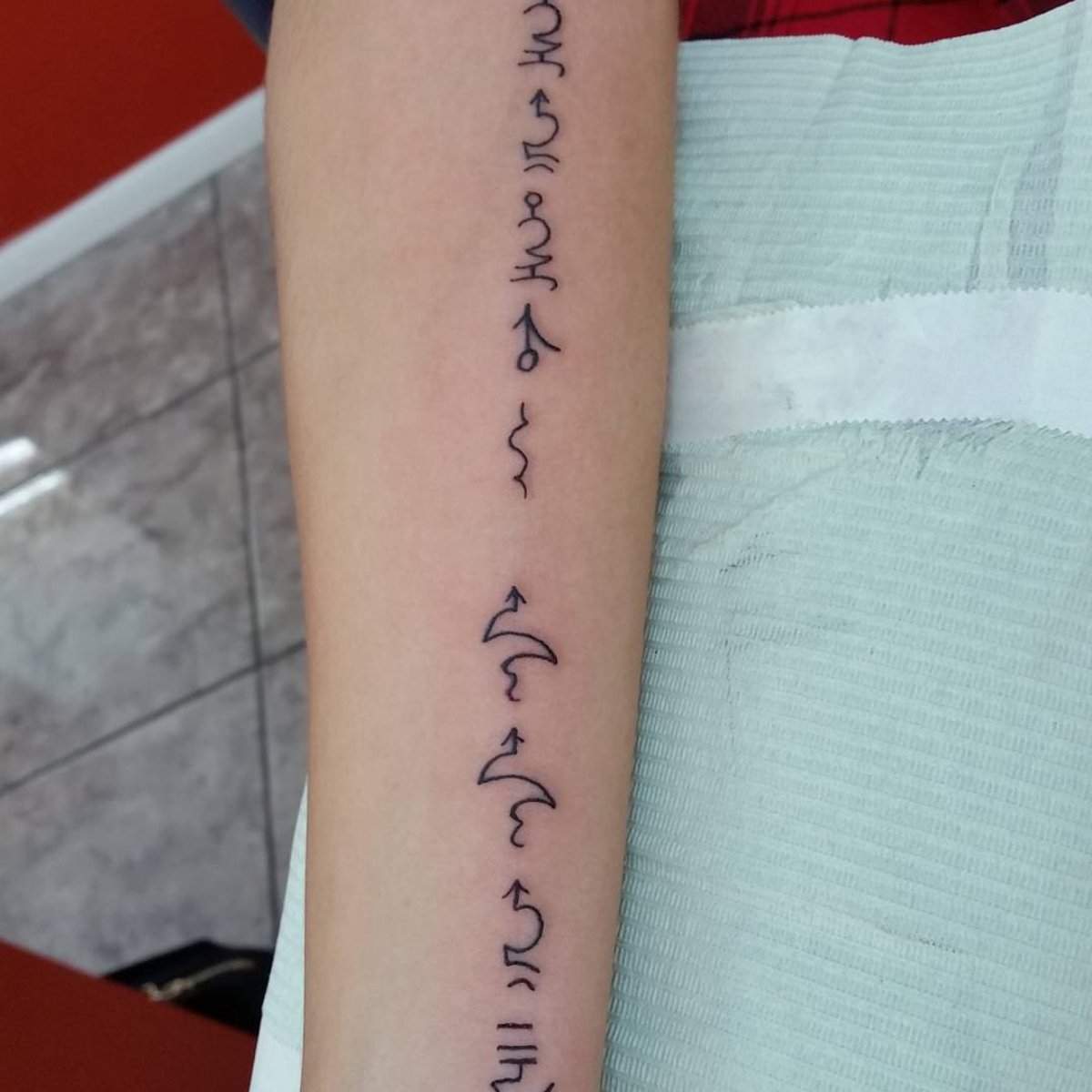 Vertical Glyphs of Intention - Tattoos.com